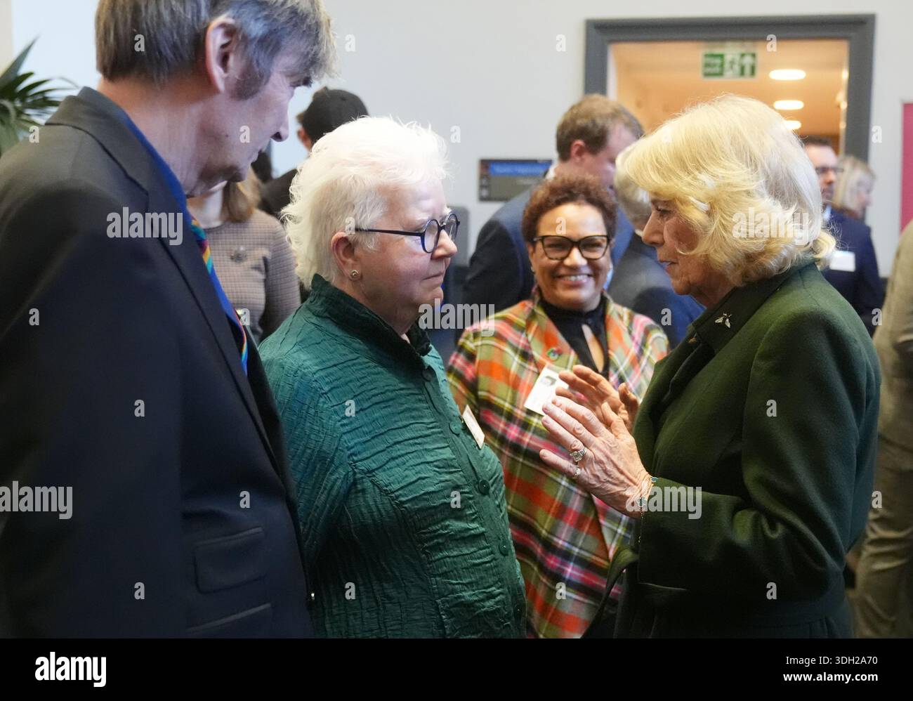 Queen Camilla speaking with Authors Val McDermid, Sir Ian Rankin and ...