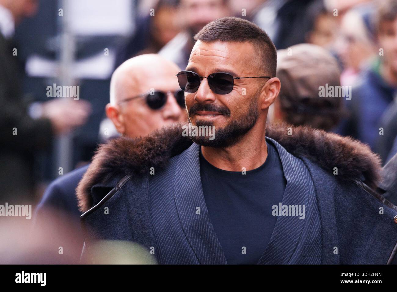 Ricky Martin arrives at the Giorgio Armani fashion show during the ...