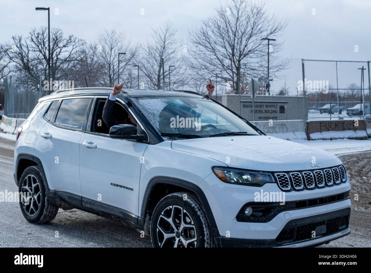 Fort Snelling, Minnesota, USA. 18th Jan, 2026. Protesters driving past ...