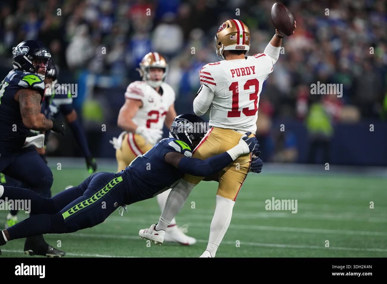 Seattle Seahawks linebacker DeMarcus Lawrence (0) tackles San Francisco ...