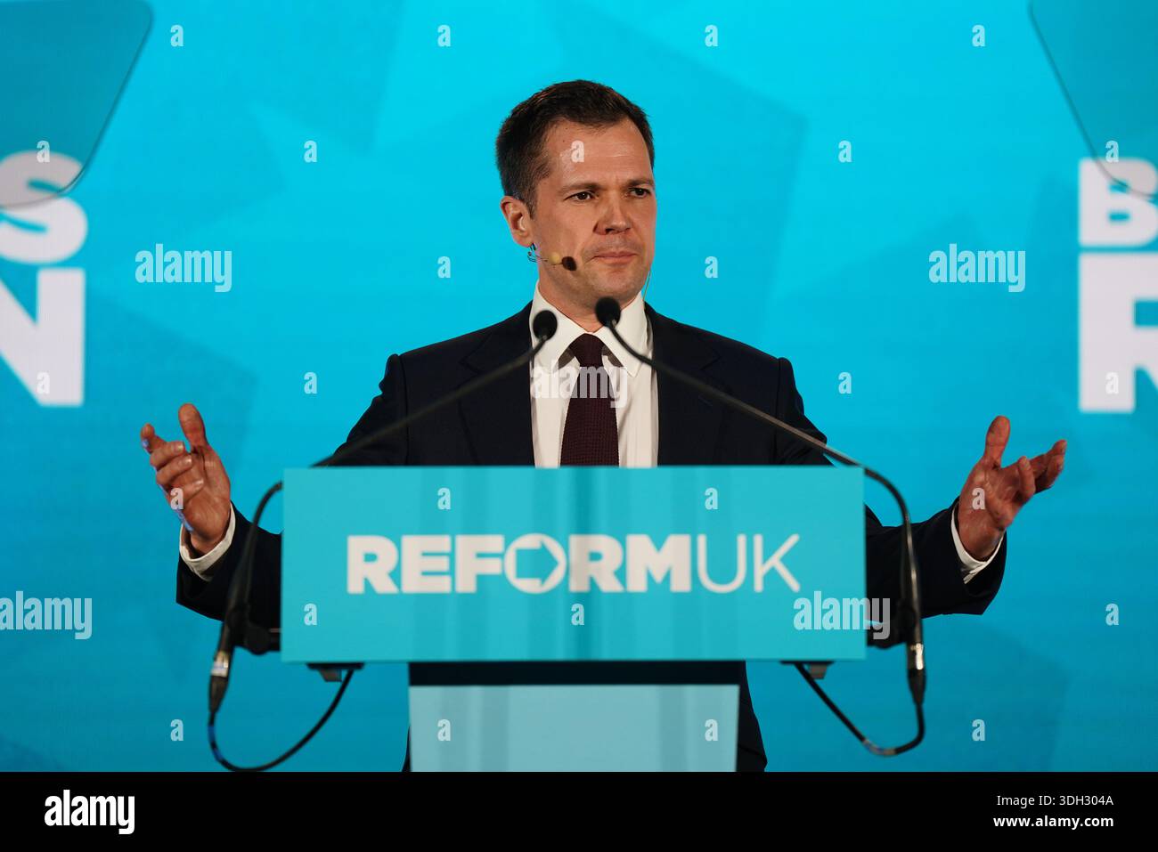 Robert Jenrick speaks during a Reform UK rally at Newark Showground in ...