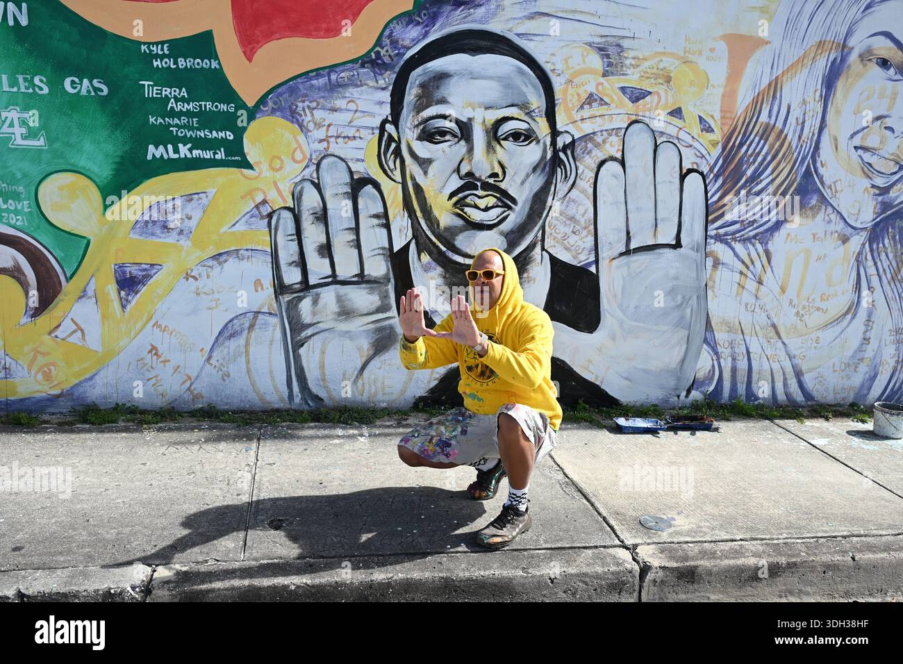 Miami, USA. 19th Jan, 2026. Artist Kyle Holbrook paints a mural of ...