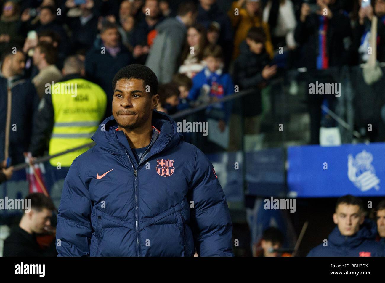 in action during the La Liga game between Real Sociedad and FC ...