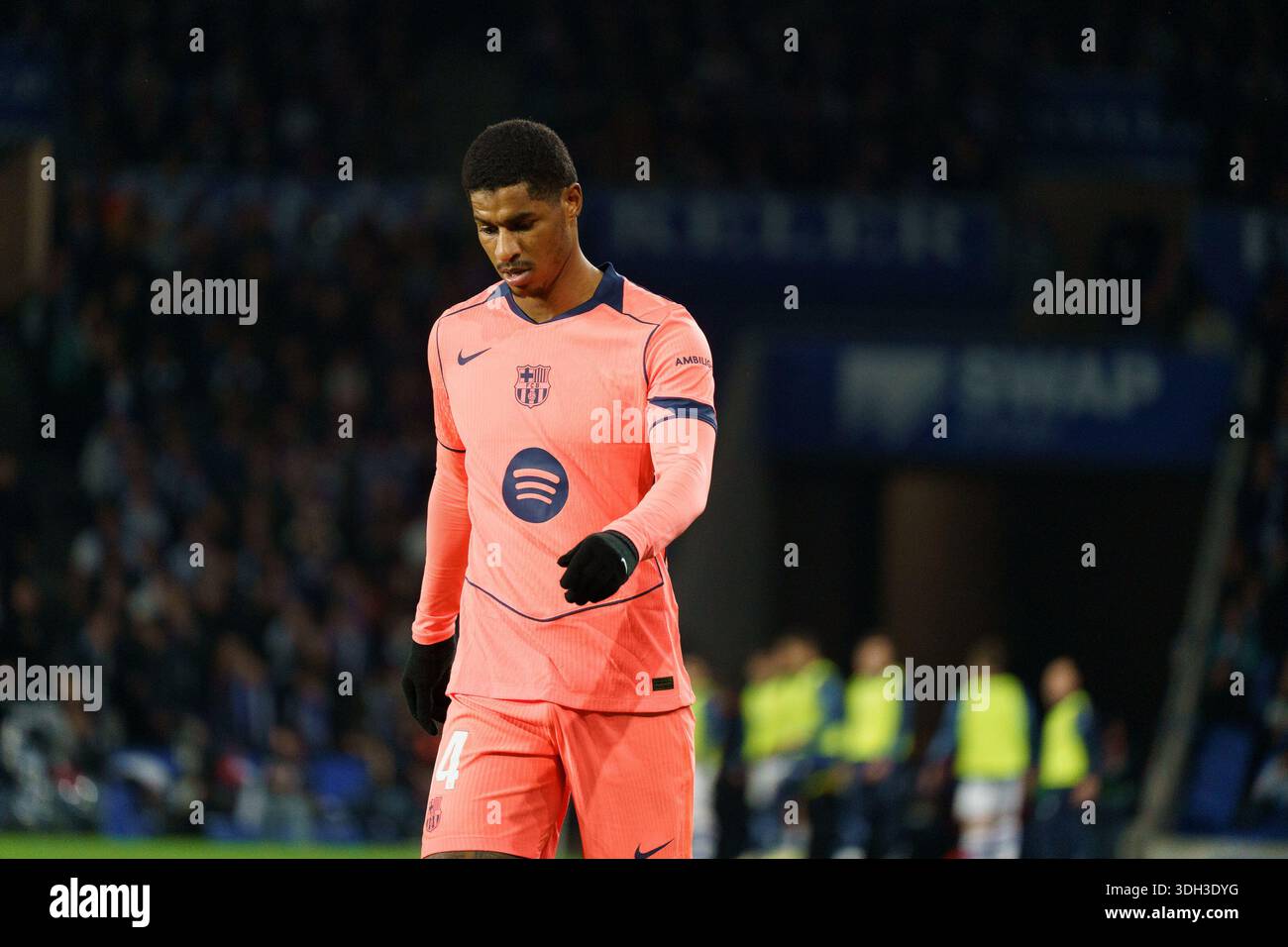 in action during the La Liga game between Real Sociedad and FC ...