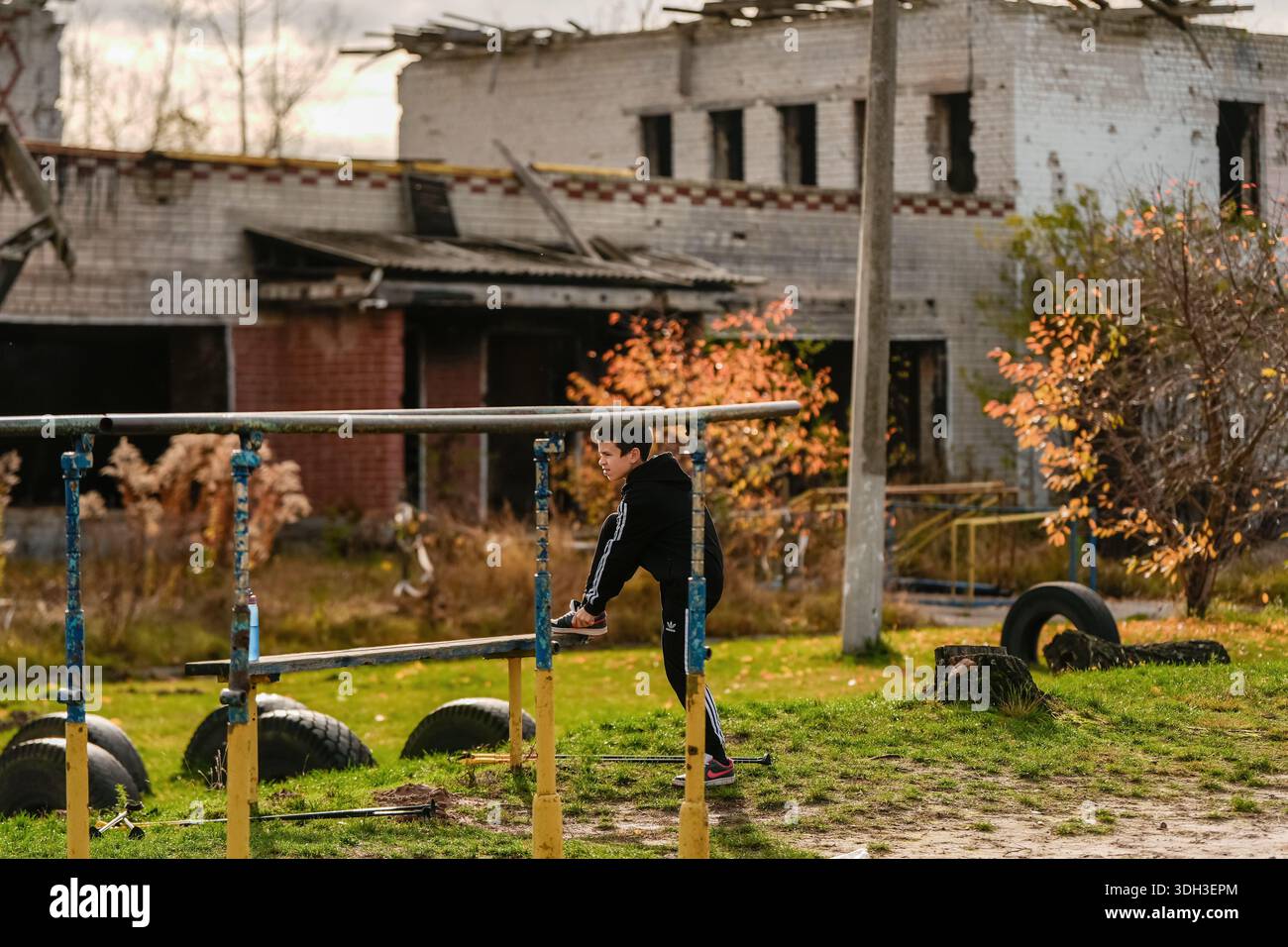 Biathlete Nazar Kravchenko 12, warms up before a training session at ...