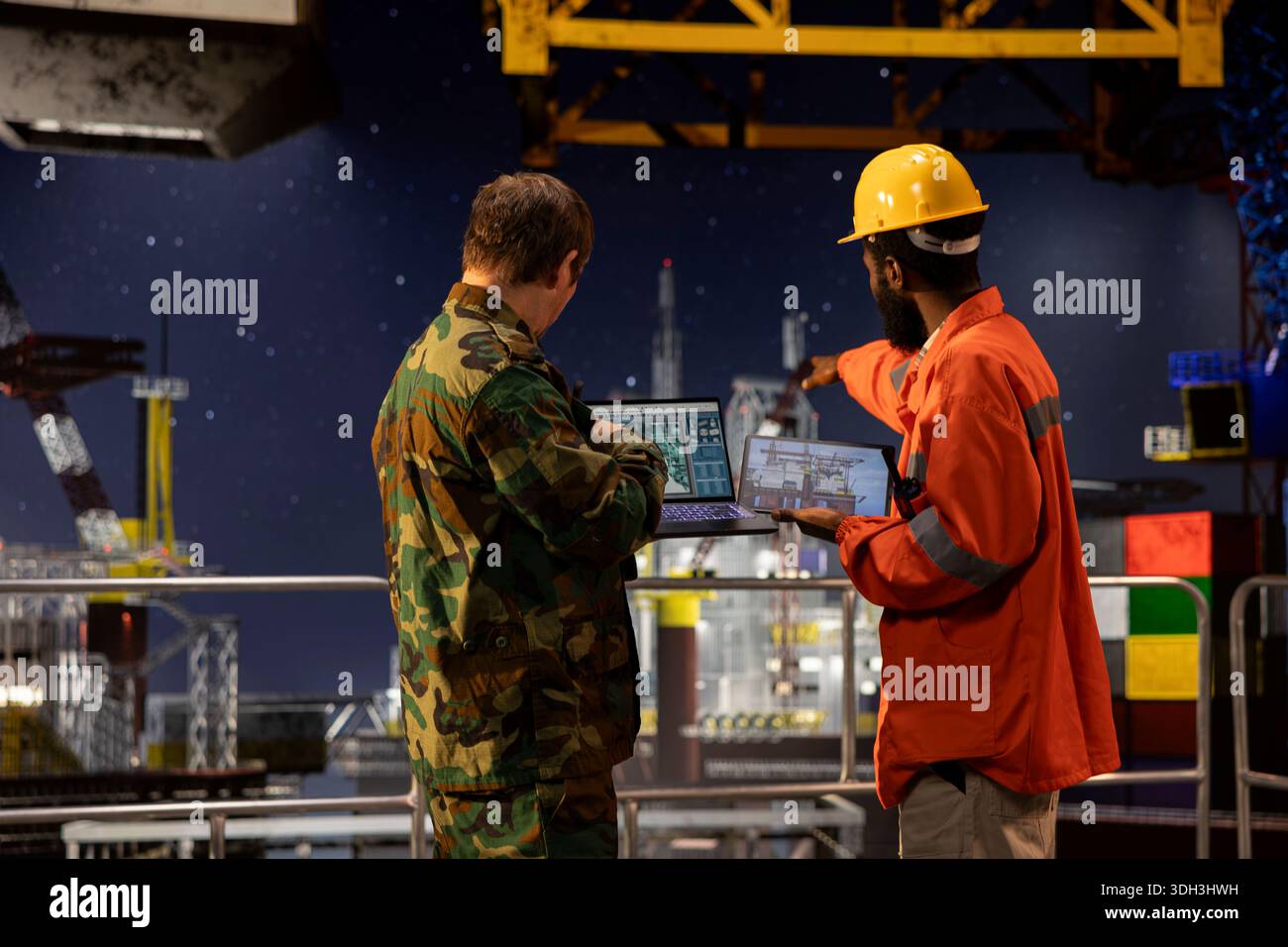 Naval soldier and african american engineer coordinating protection and ...