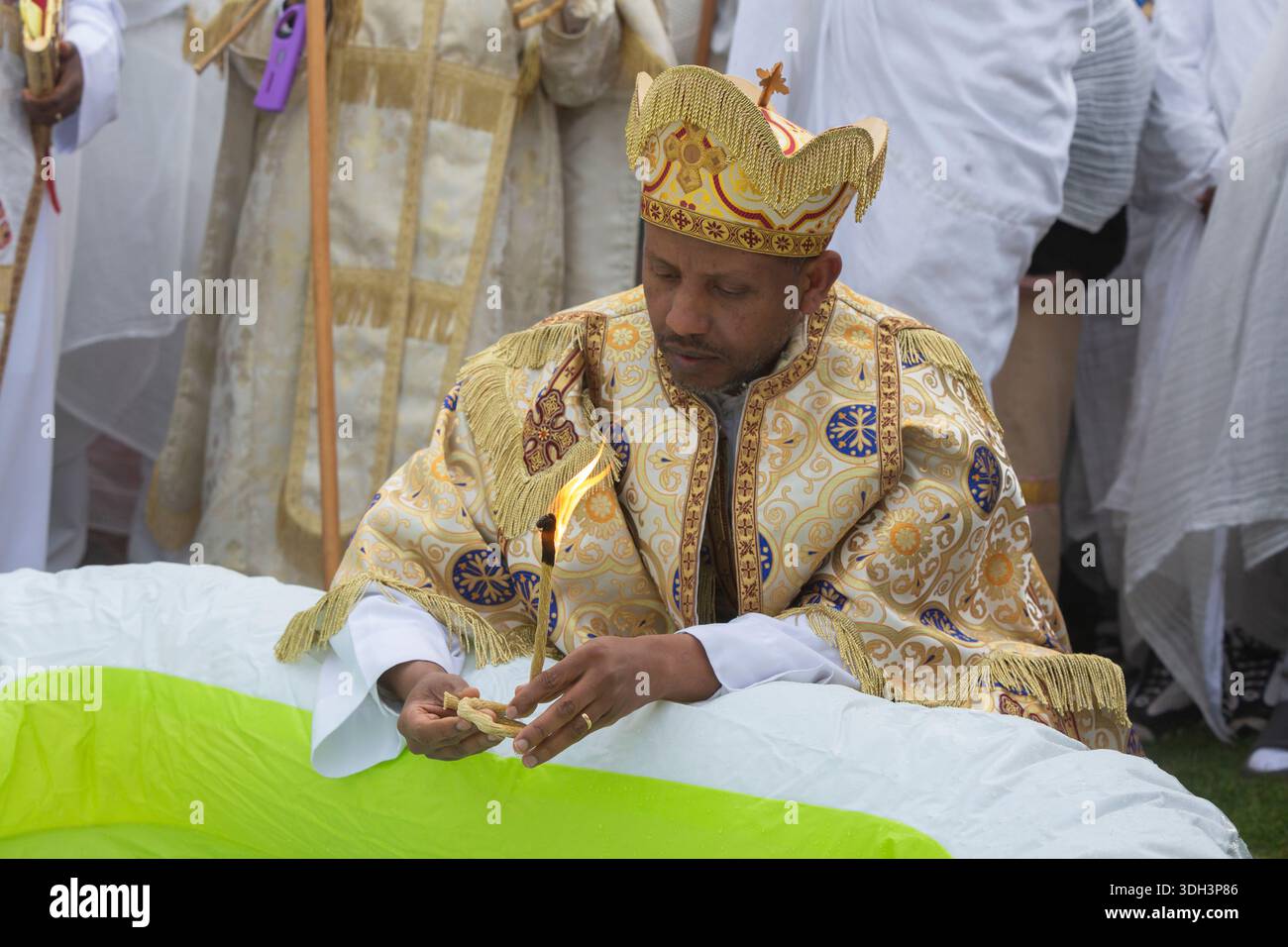 Seattle, Washington, USA. 19 January 2026. A religious official places ...