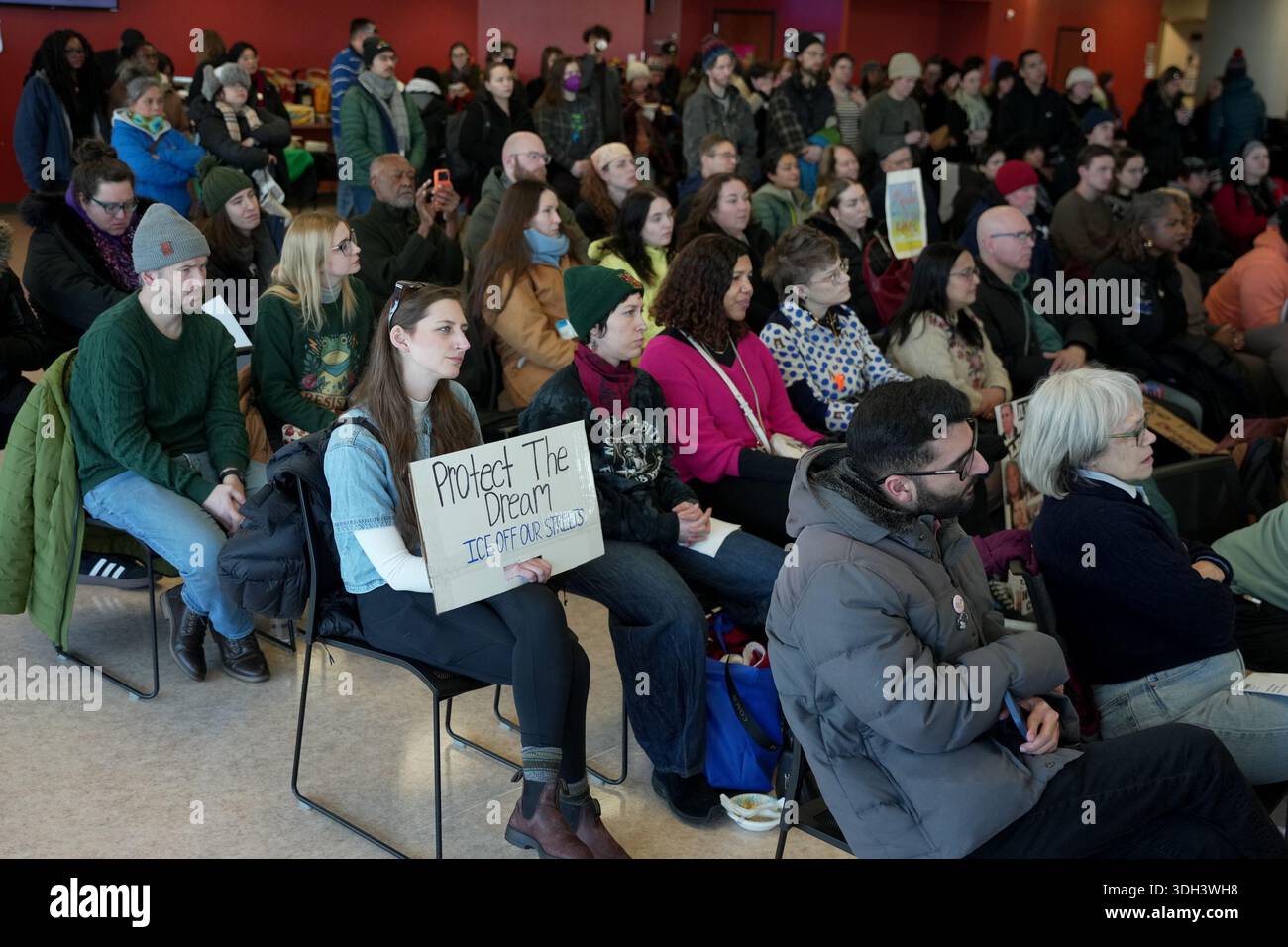 People protest ICE at an indoor rally hosted by St. Paul college on MLK ...