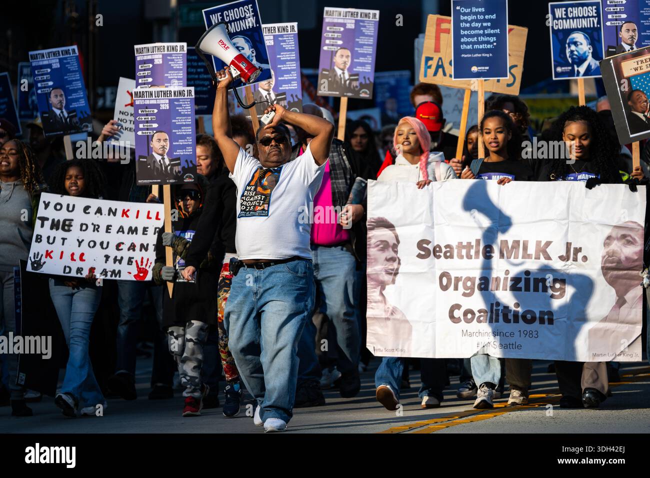 Seattle, USA. 19th Jan, 2026. Thousands gather and march on Martin ...