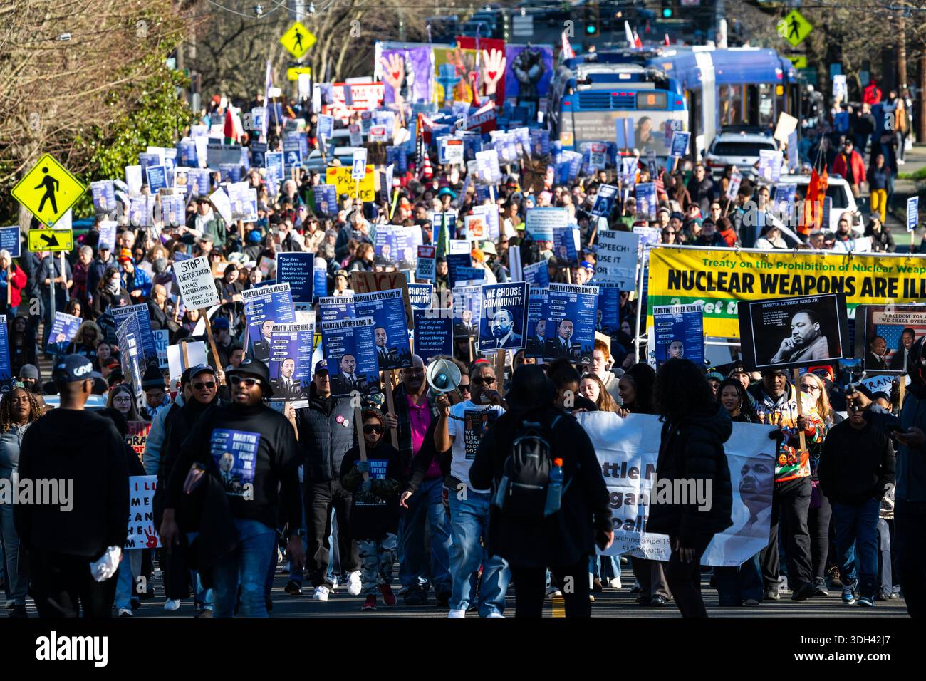 Seattle, USA. 19th Jan, 2026. Thousands gather and march on Martin ...