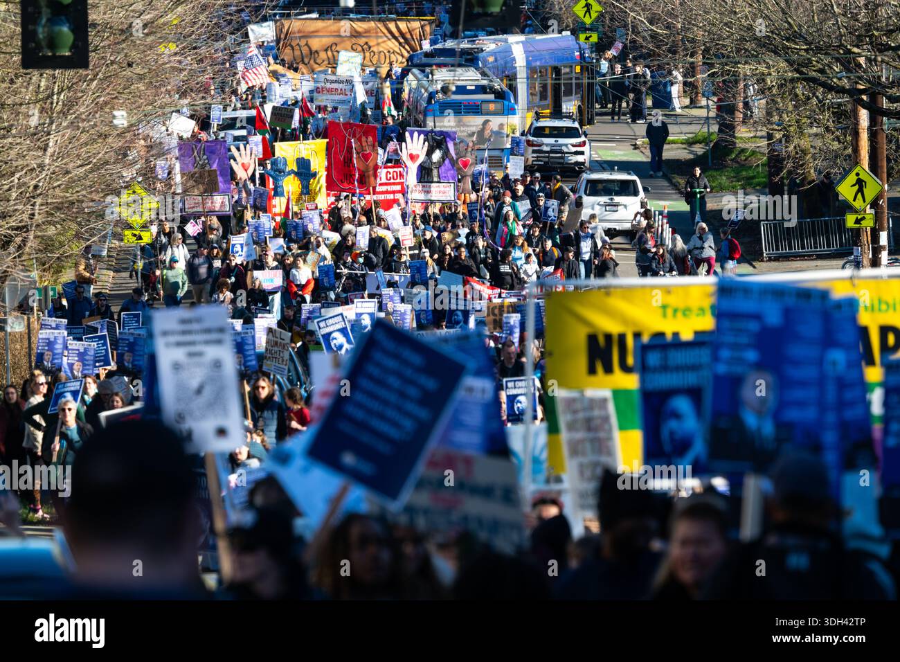 Seattle, USA. 19th Jan, 2026. Thousands gather and march on Martin ...