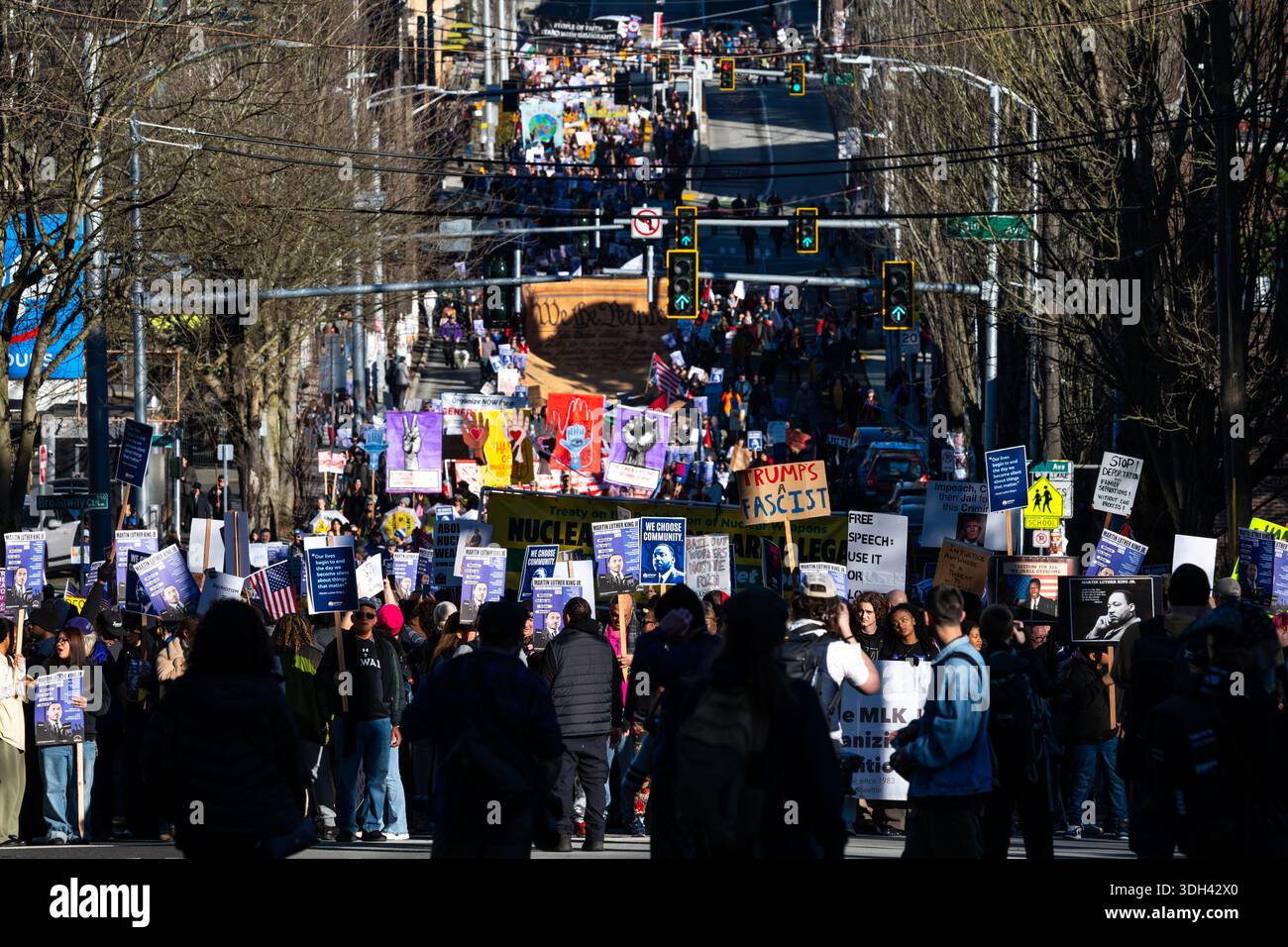 Seattle, USA. 19th Jan, 2026. Thousands gather and march on Martin ...