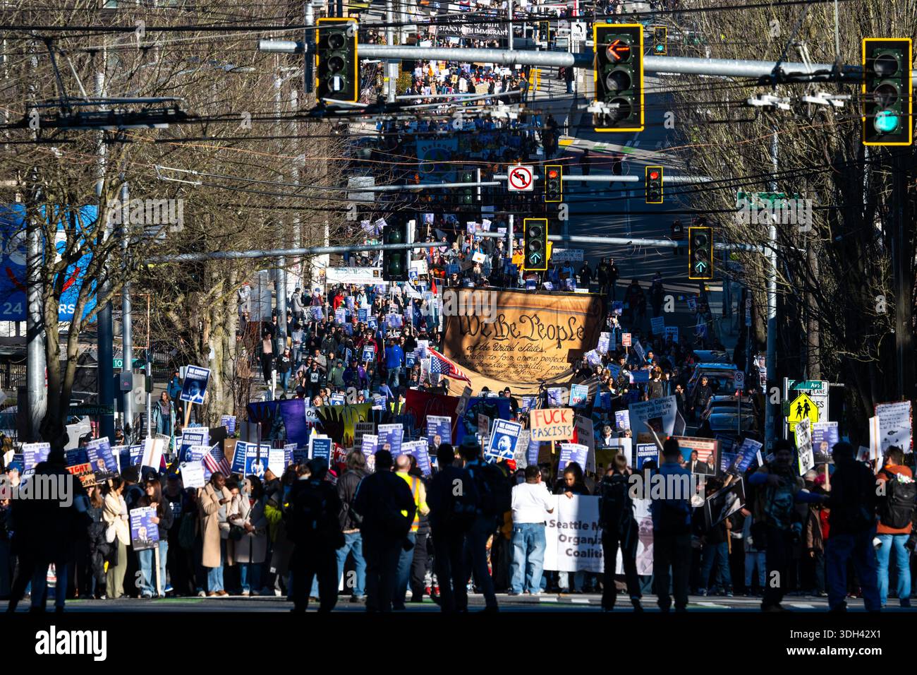 Seattle, USA. 19th Jan, 2026. Thousands gather and march on Martin ...