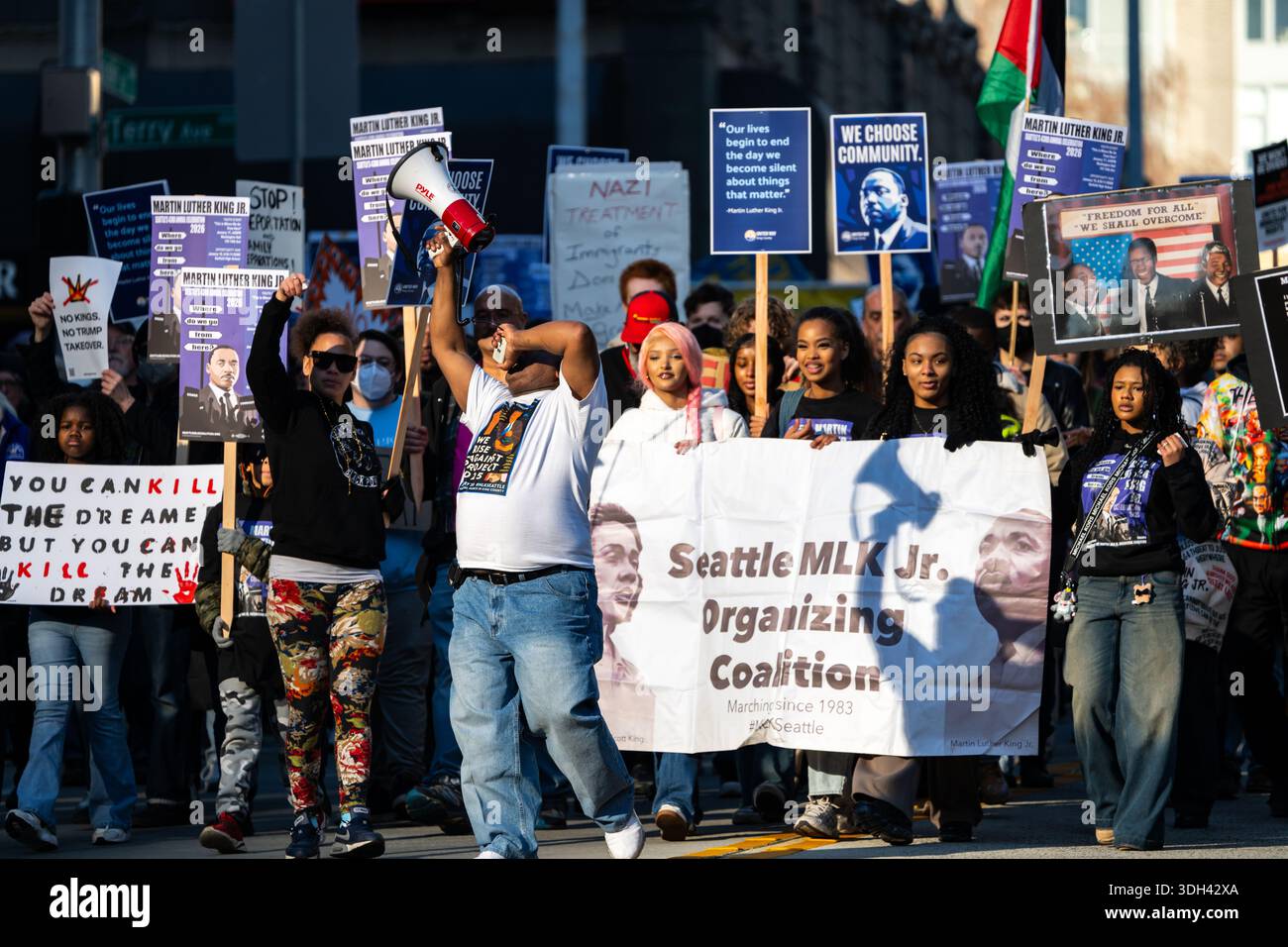 Seattle, USA. 19th Jan, 2026. Thousands gather and march on Martin ...