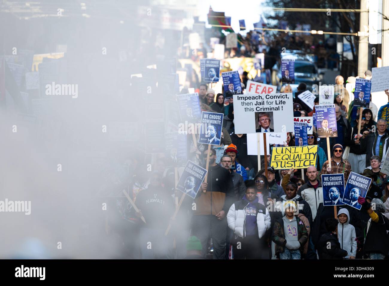 Seattle, USA. 19th Jan, 2026. Thousands gather and march on Martin ...