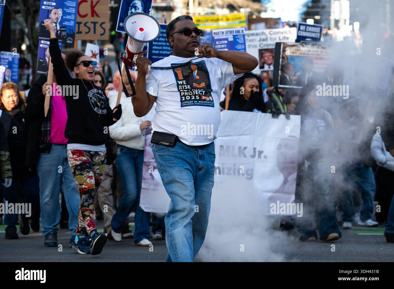 Seattle, USA. 19th Jan, 2026. Thousands gather and march on Martin ...