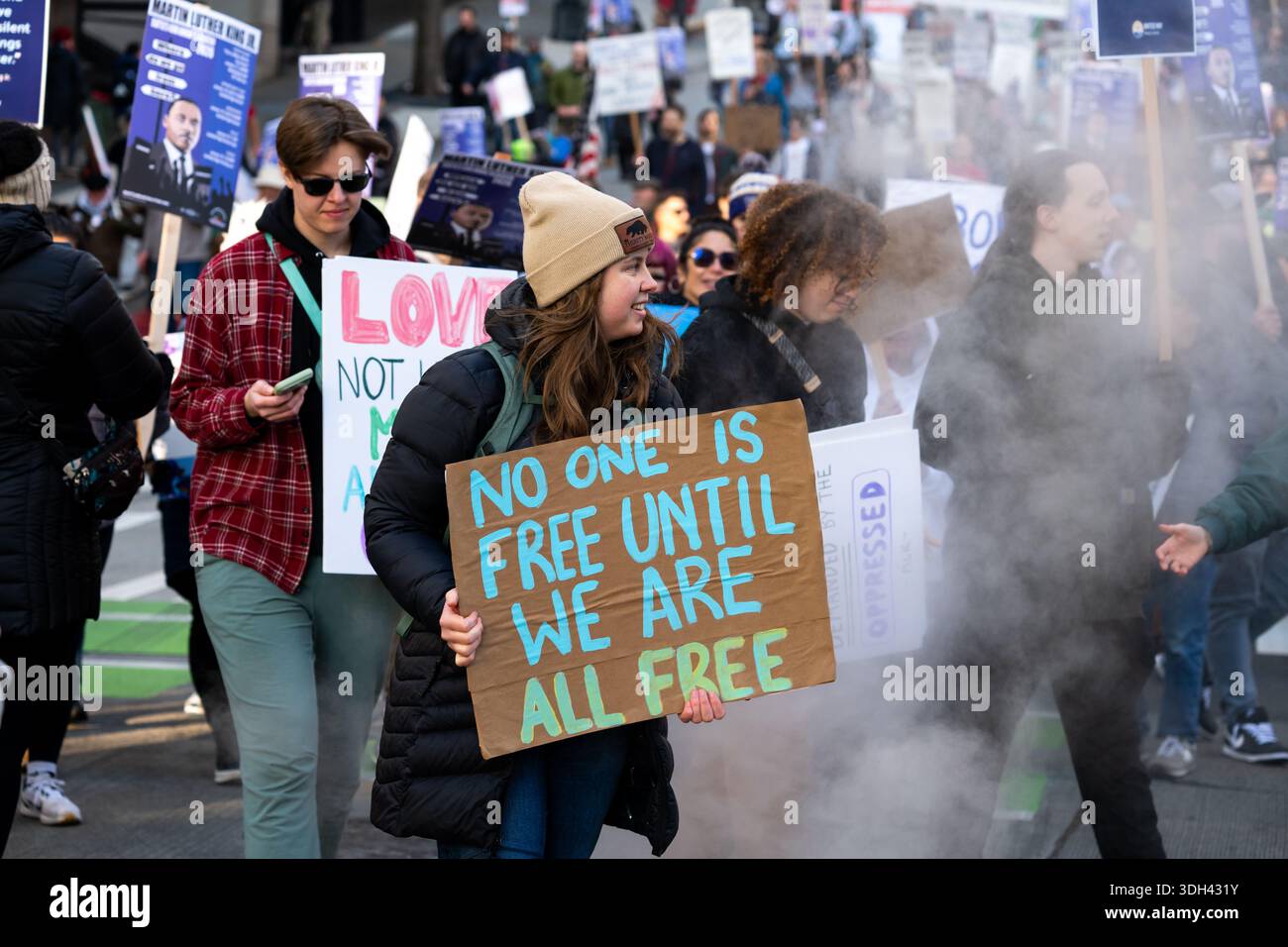 Seattle, USA. 19th Jan, 2026. Thousands gather and march on Martin ...