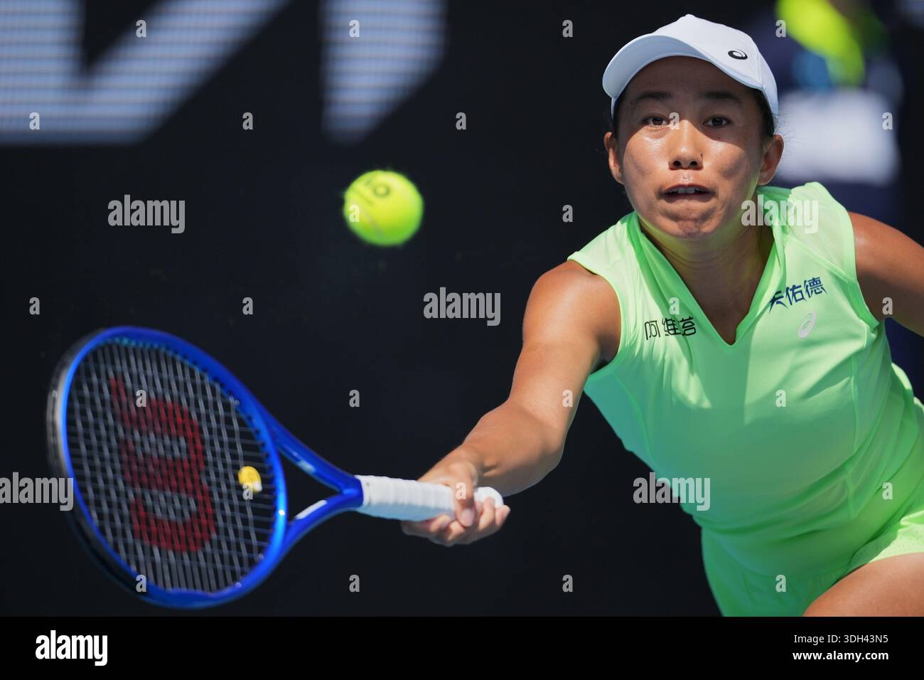 Zhang Shuai of China plays a forehand return to Taylah Preston of ...