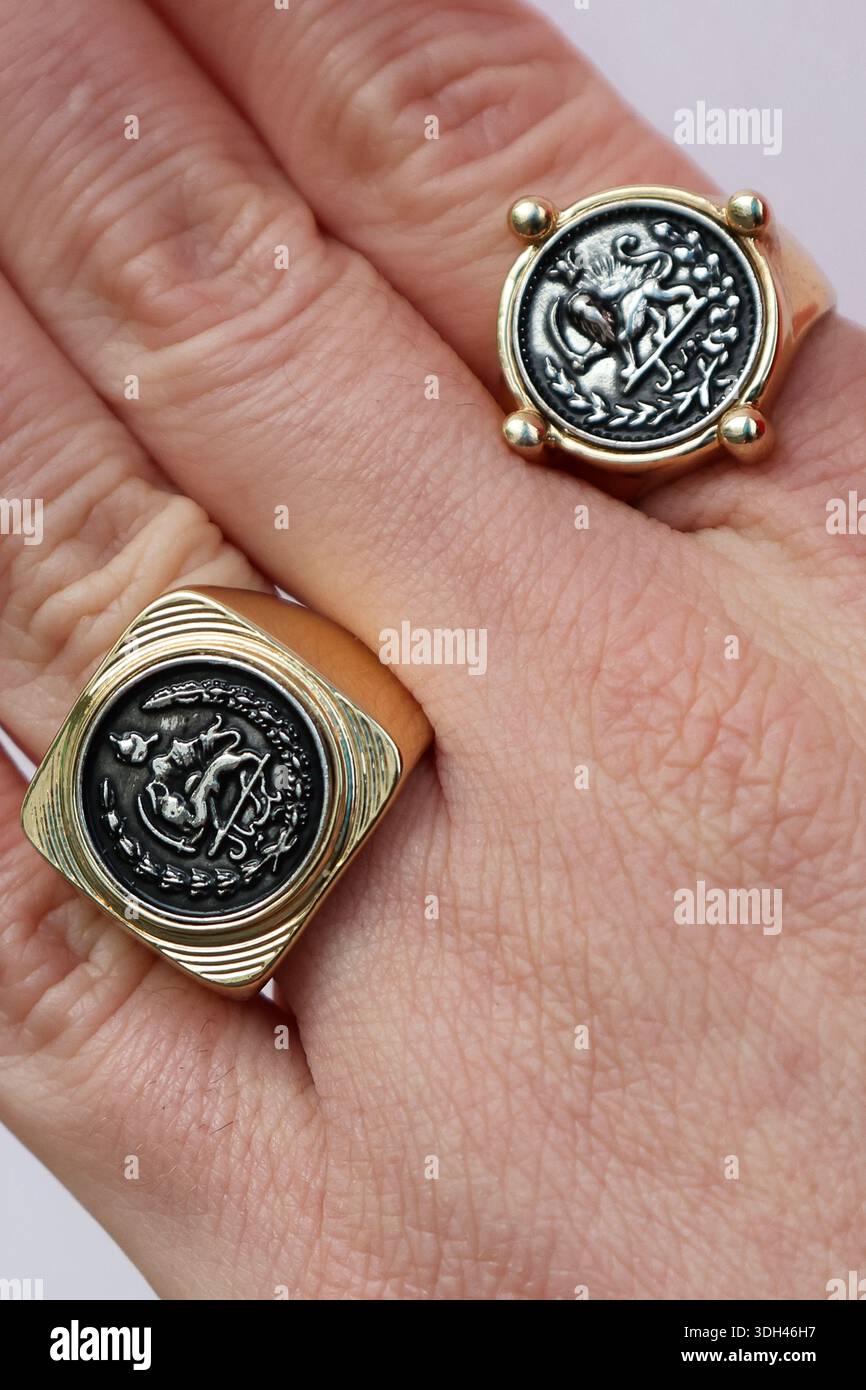 An Iranian protester seen wearing Pahlavi Lion & Sun rings during a ...