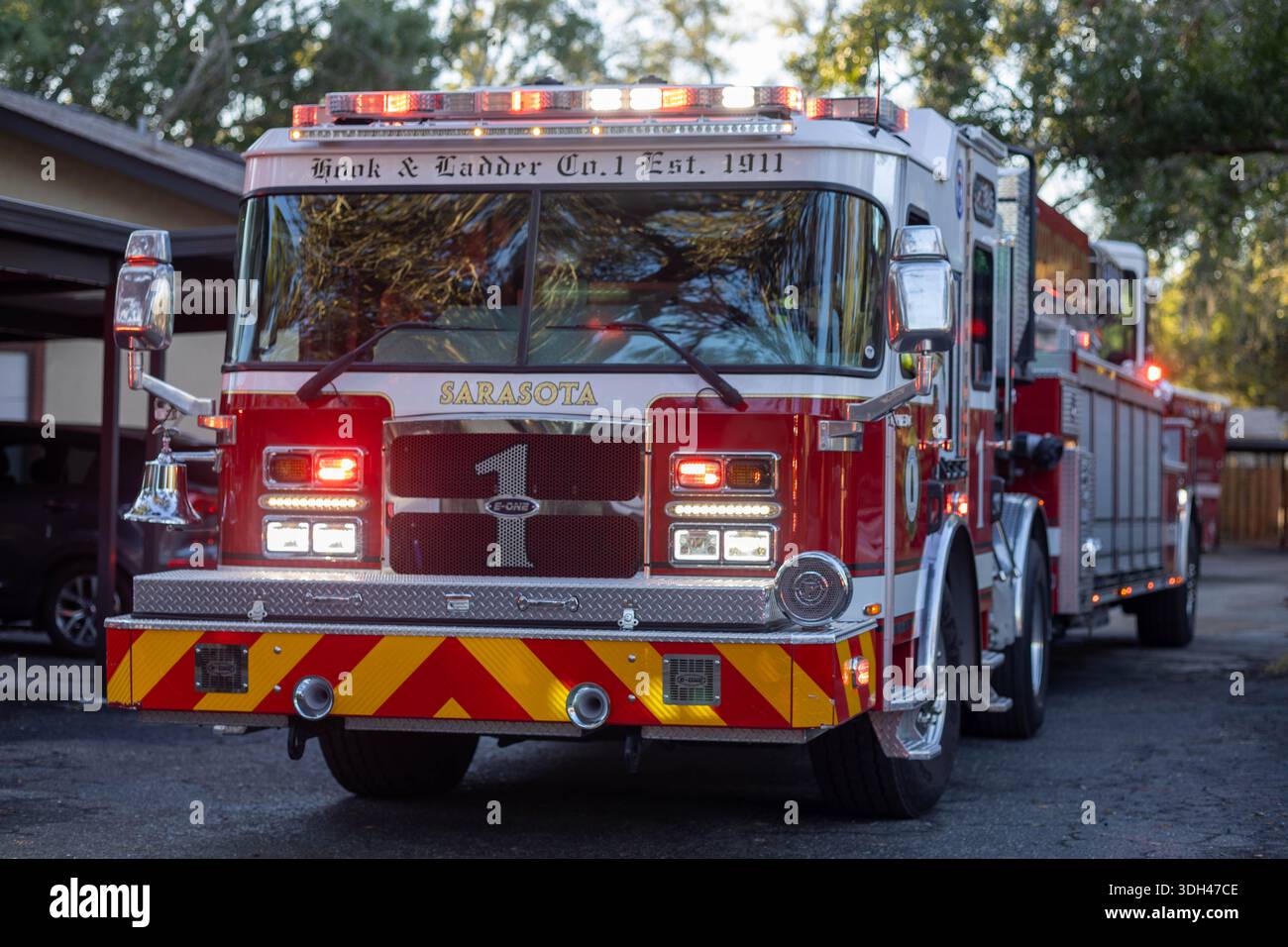 SARASOTA, FL, USA - JANUARY 15, 2026: A front view of a red and white ...
