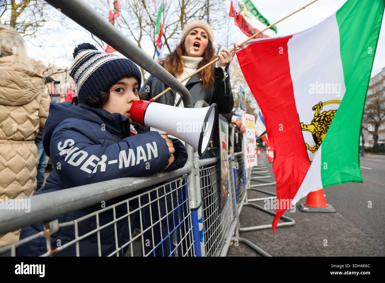 A young Iranian protester demonstrates outside the Embassy of the ...