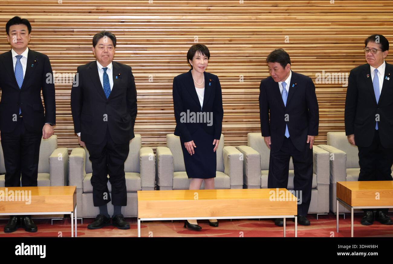 Japan's Prime Minister Sanae Takaichi (C) attends a cabinet meeting at ...