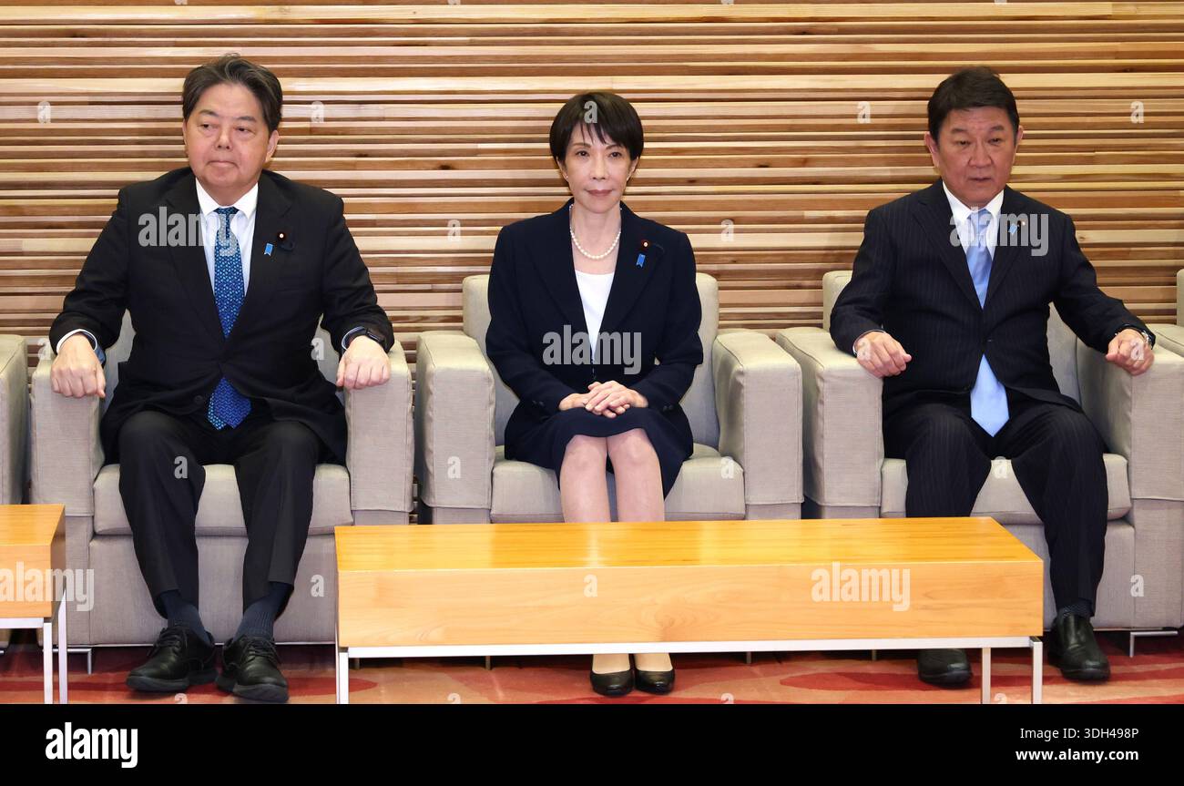 Japan's Prime Minister Sanae Takaichi (C) attends a cabinet meeting at ...