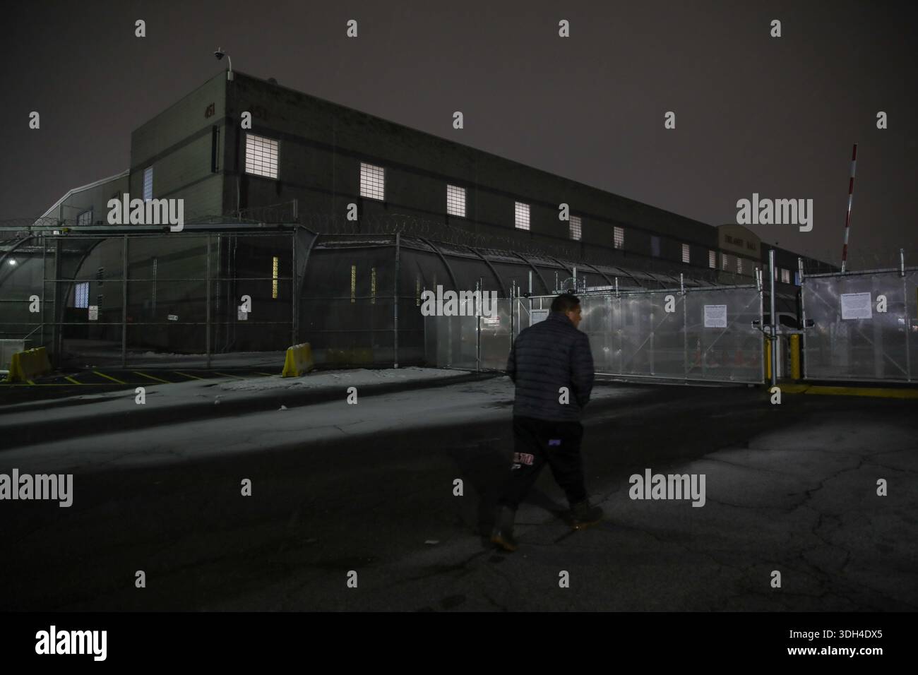 A man walks to the Delaney Hall immigration detention center. Delaney ...