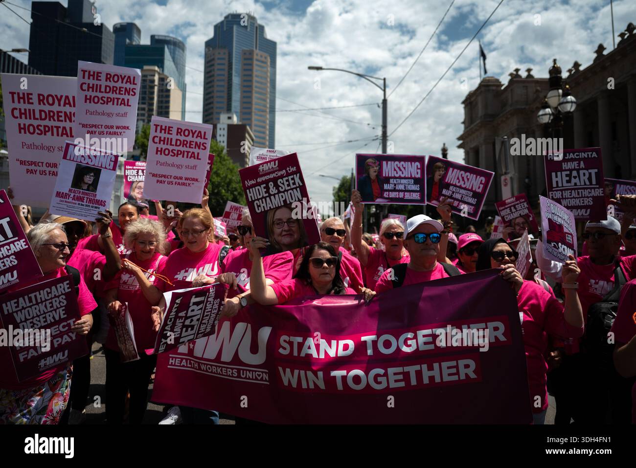 Healthcare workers march during a statewide strike over pay and ...