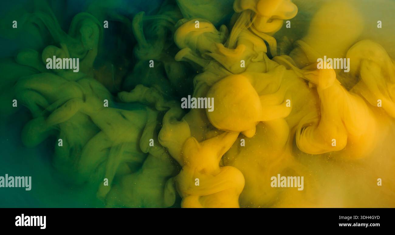 Ink splash mist yellow art hi-res stock photography and images - Alamy