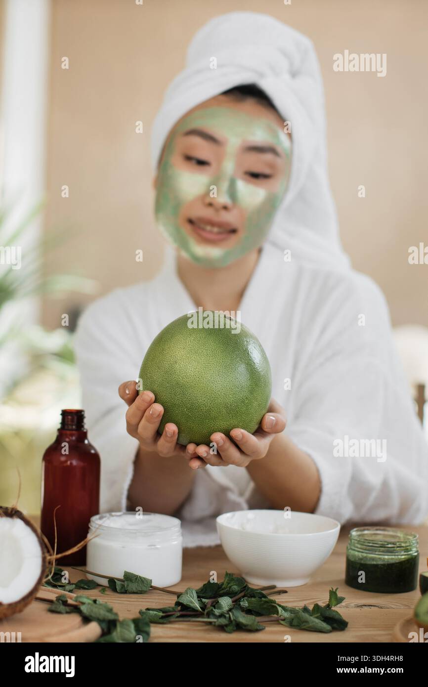 Woman With Green Face Mask Stock Photo - Alamy