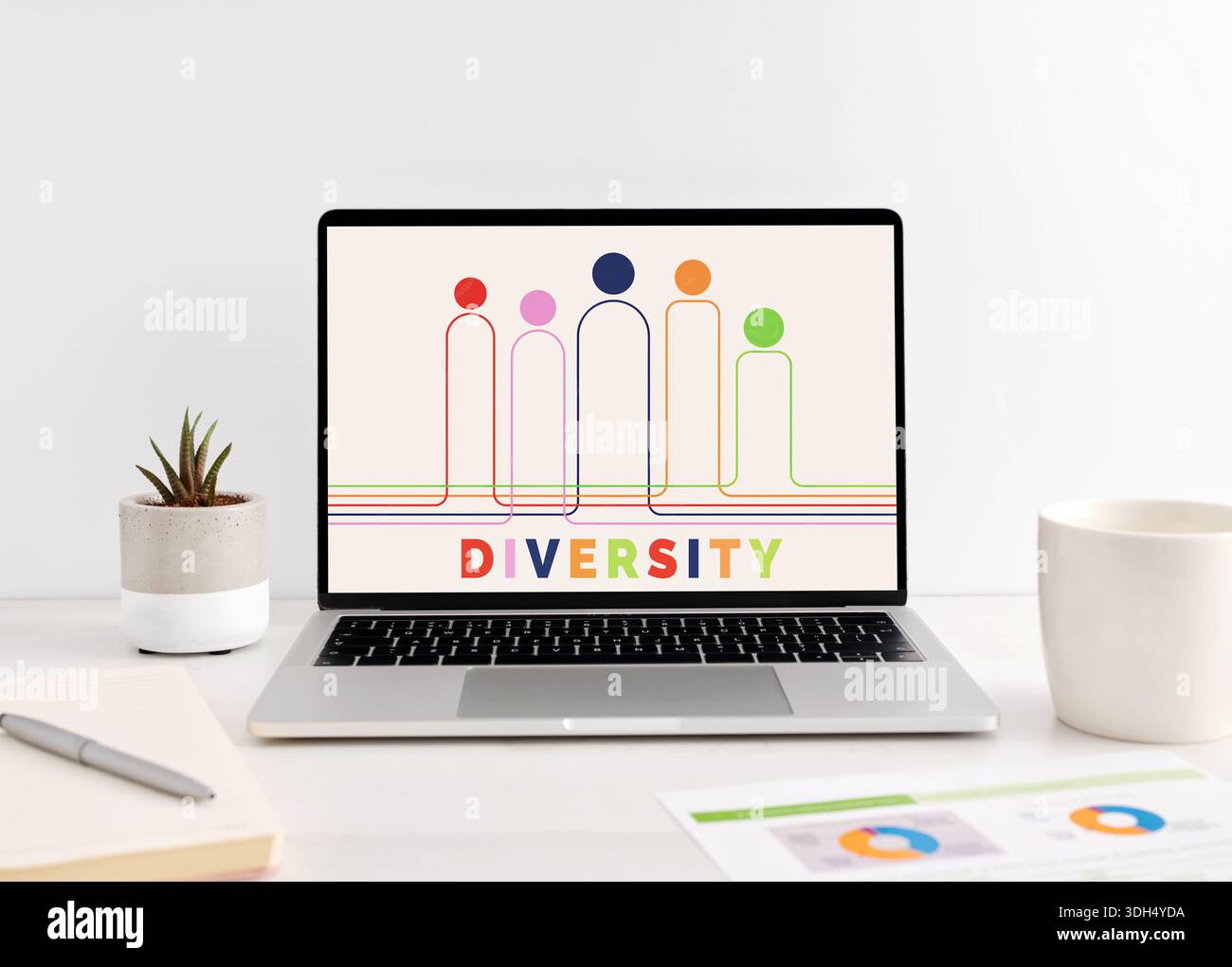 Laptop displaying an infographic with diverse stylized people icons ...