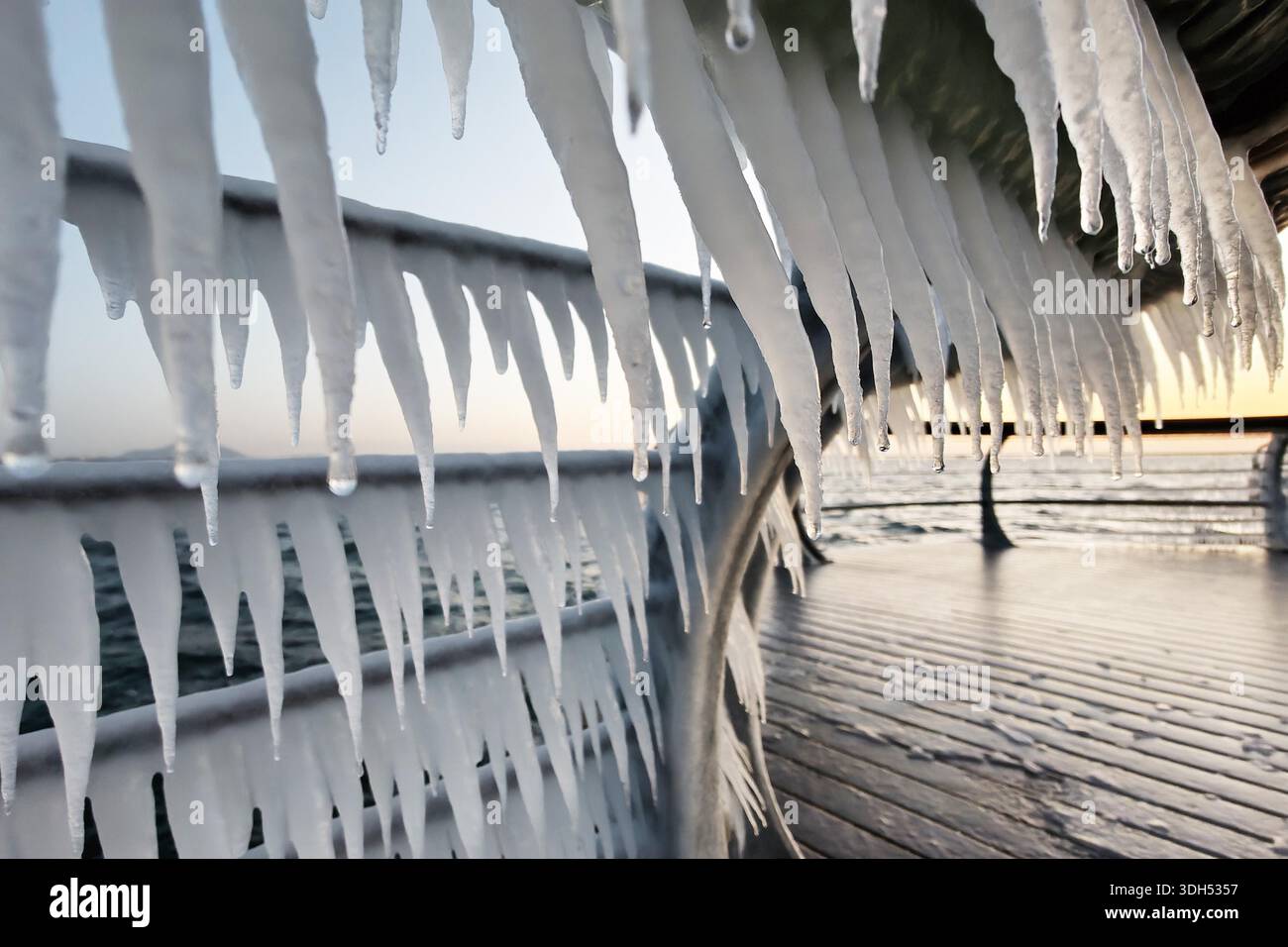 Icicles form on railings along the coastline in Dalian City, northeast ...