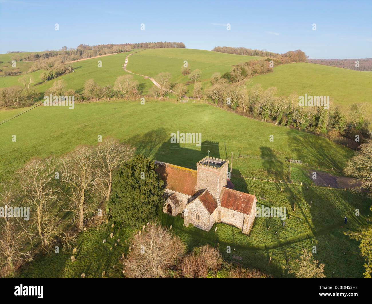 aerial view of East Dean parish church of All Saints dating from the ...