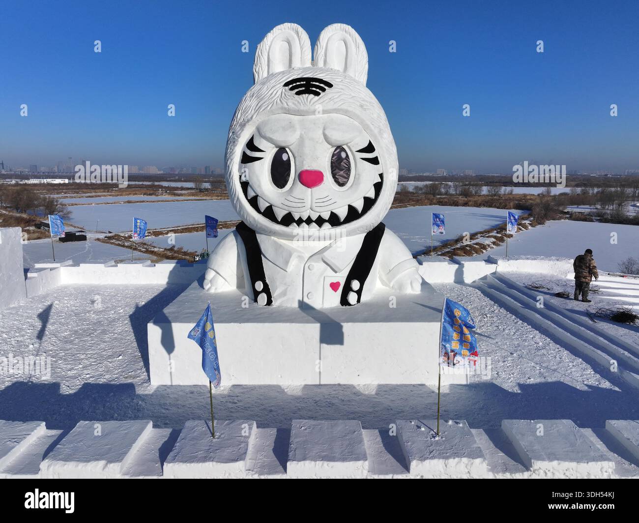 A new snow sculpture 'Labubu' is unveiled beside the viral giant ...