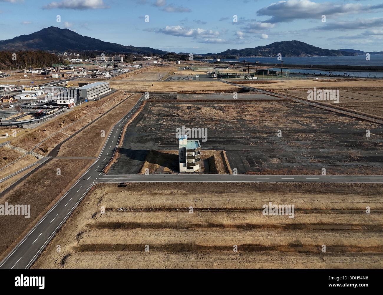 A drone photo shows the Yonezawa Shokai Building, which was about 15 ...
