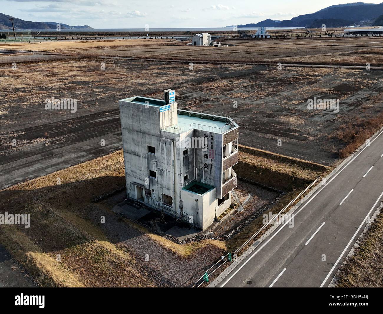 A drone photo shows the Yonezawa Shokai Building, which was about 15 ...