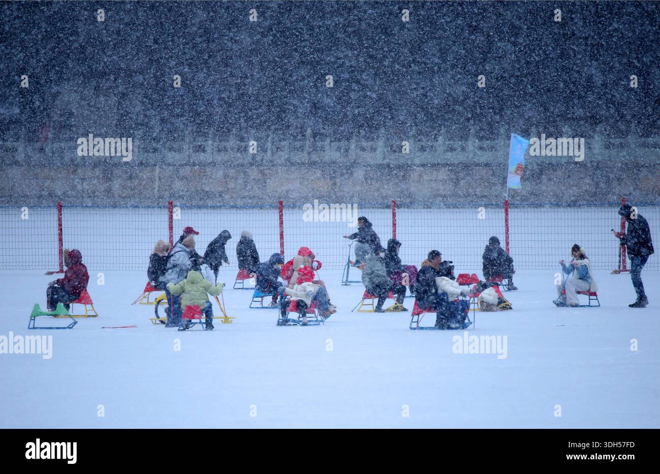 Visitors enjoy ice activities at the Summer Palace Kunming Lake ice ...