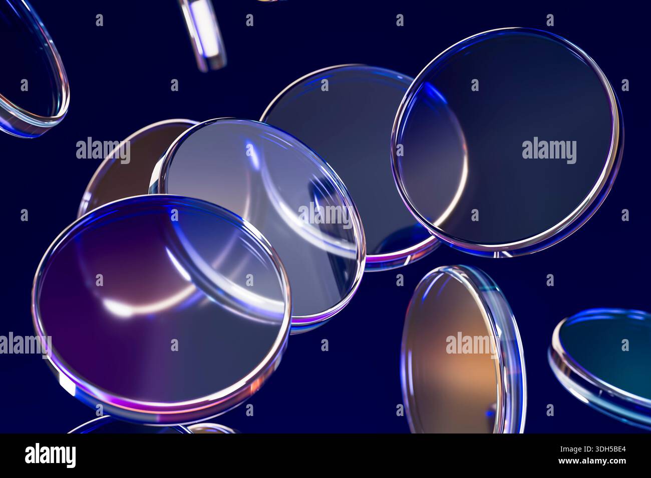 A collection of circular glass shapes with reflective surfaces ...