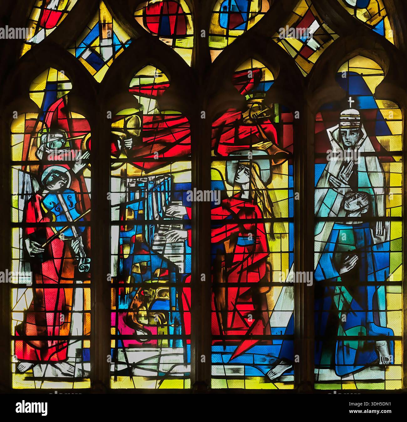 Stained glass window, of St Catherine playing an organ, in the ...