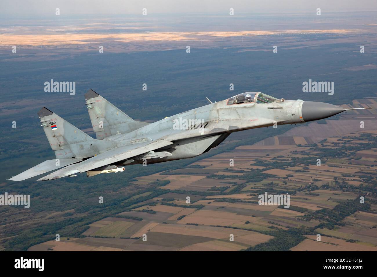 This image features a Serbian Air Force MiG-29, registration 18203, in ...