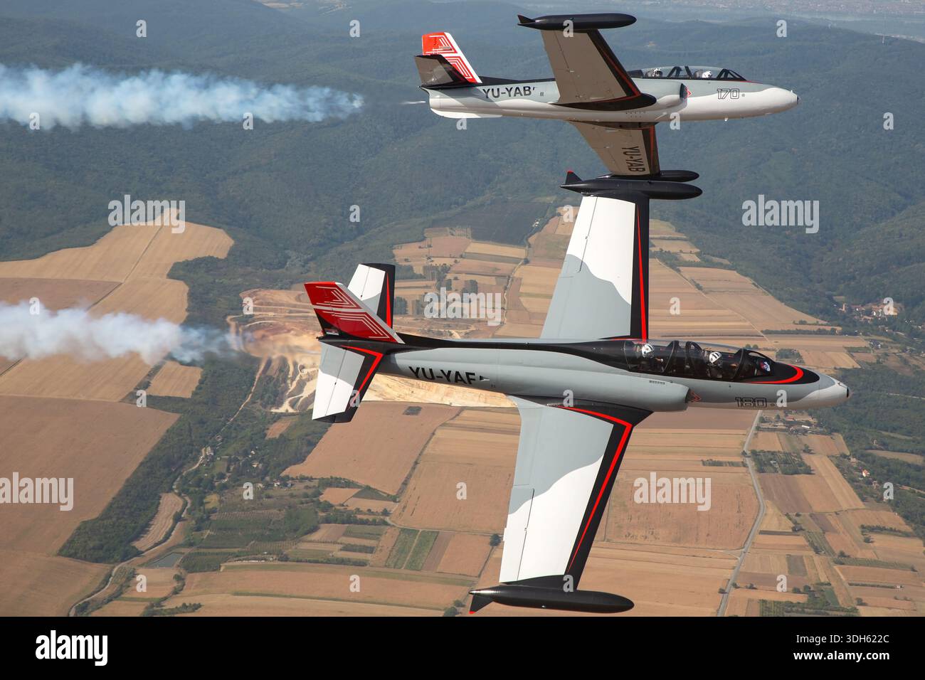 The photograph depicts two Soko G-2A Galeb military trainer jets ...