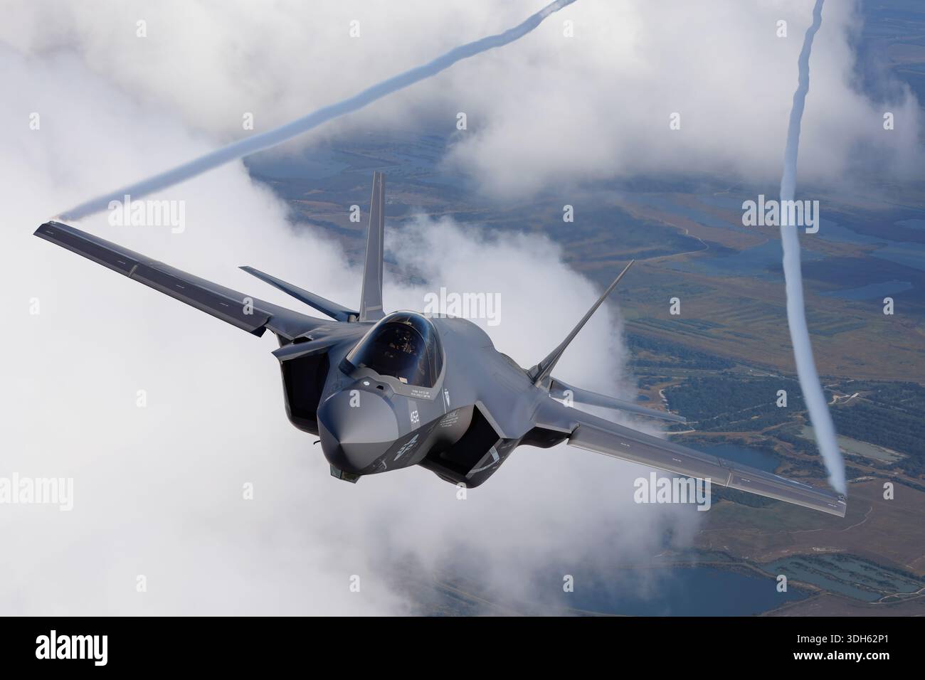 The F-35C Lightning II, Reg. NJ-452, of VFA-125 Rough Raiders, is a U.S ...