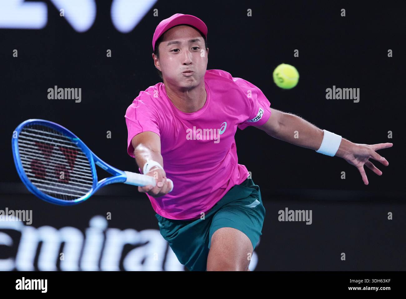 Shintaro Mochizuki of Japan plays a forehand return to Stefanos ...