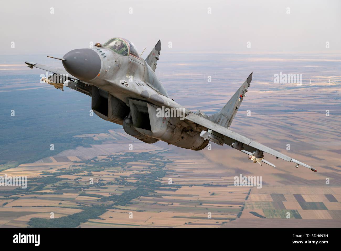 The photograph shows a Serbian Air Force Mikoyan-Gurevich MiG-29 ...