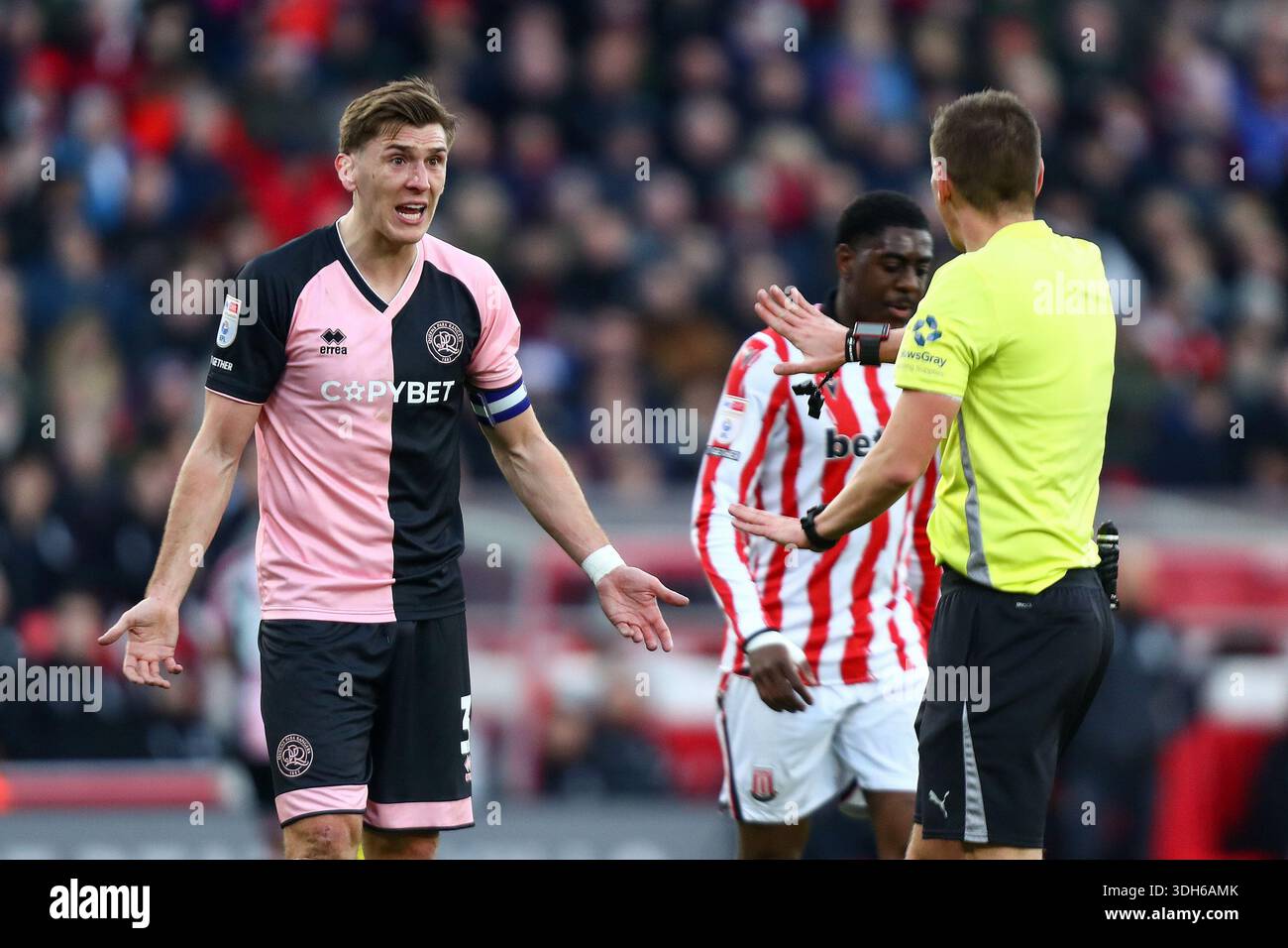 Jimmy Dunne of Queens Park Rangers gestures to Referee, Matthew Donohue ...