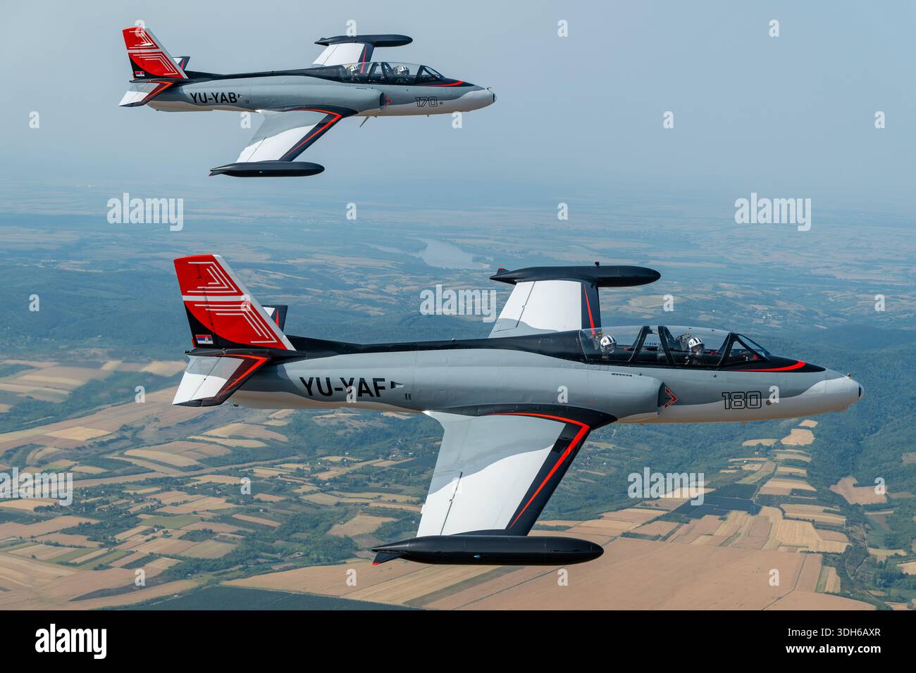 The photograph features two Soko G-2A Galeb aircraft operated by the ...