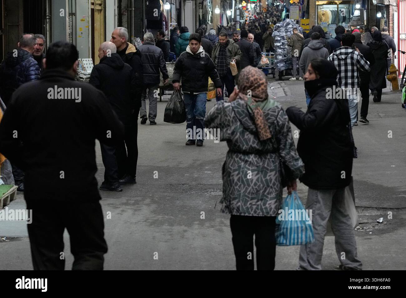 People conduct their businesses at Tehran's historic Grand Bazaar ...