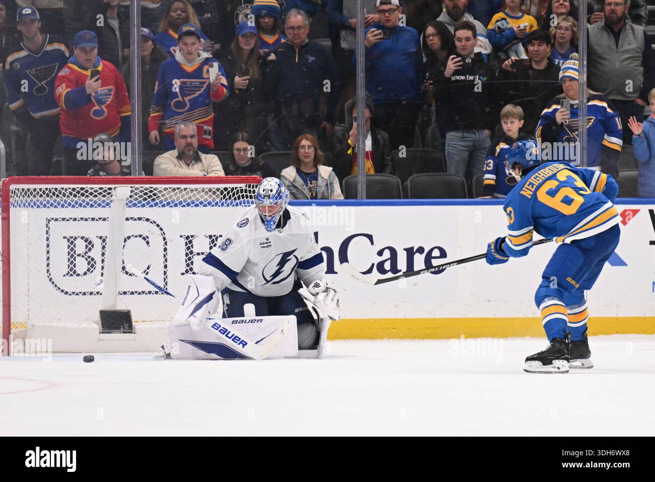 St. Louis Blues' Jake Neighbours, right, is unable to score past Tampa ...
