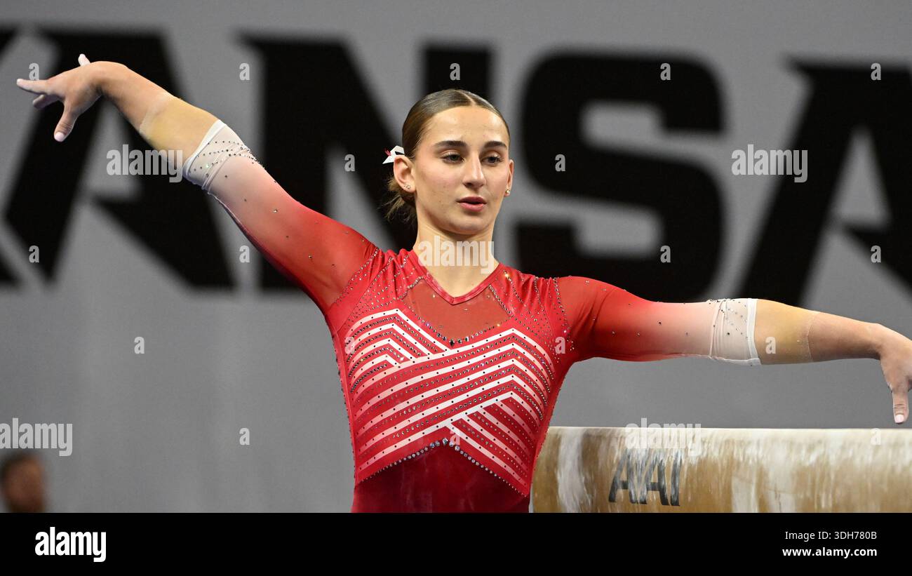 Arkansas gymnast Allison Cucci competes on the beam during an NCAA ...